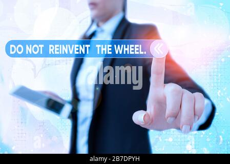 Writing note showing Do Not Reinvent The Wheel. Business concept for ...