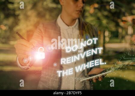 Writing note showing Do Not Reinvent The Wheel. Business concept for ...