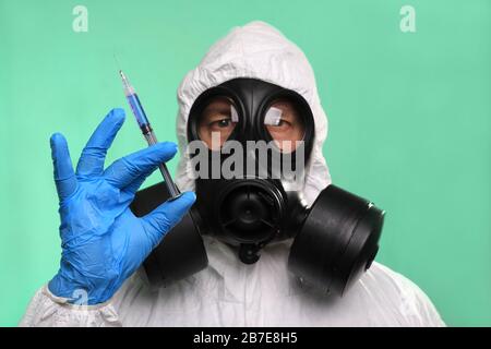 Man wearing gas mask lab protective gear respirator goggles eye ...