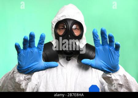 Man wearing gas mask lab protective gear respirator goggles eye ...