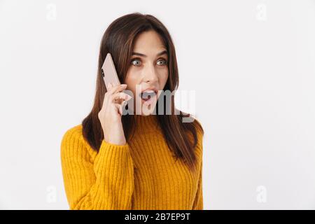 Photo portrait of amazed girl talking on mobile phone laughing wearing ...