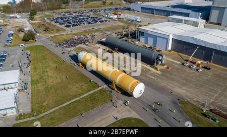 . Crews at NASA’s Michoud Assembly Facility in New Orleans load ...