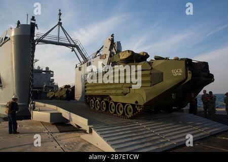 A Marine Corps AAVP-7A1 amphibious assault vehicle crosses into Kuwait ...