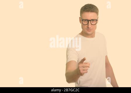 portrait of irritated man pointing at the camera Stock Photo - Alamy