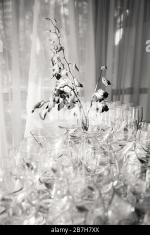 pile of empty wine glasses on table Stock Photo - Alamy