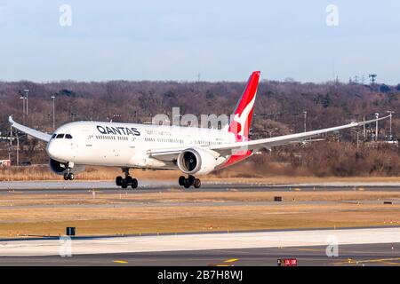 Qantas Airways Boeing 787 aircraft landing with spoilers and ailerons ...
