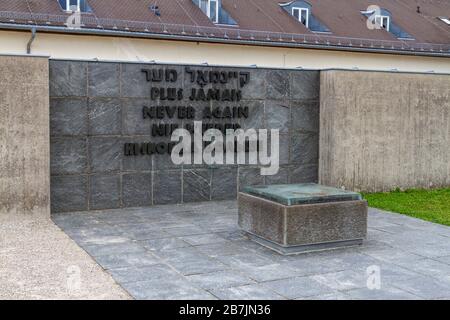 "Never Again" in five languages on the Unknown Prisoner memorial at the ...