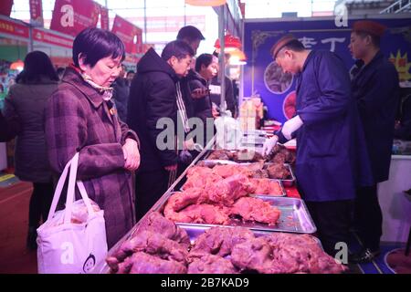 Citizens select New Year decorations at shops in Nanning City, south ...
