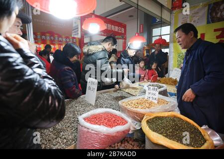 Citizens select New Year decorations at shops in Nanning City, south ...