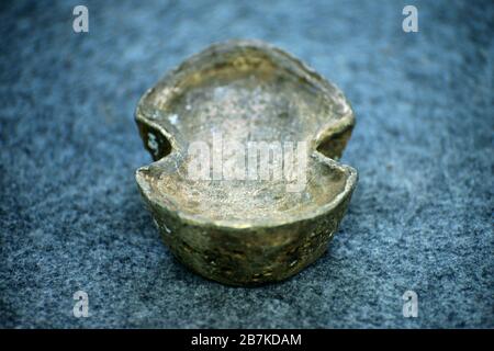 An ancient Chinese silver ingot of Ming Dynasty is on display at the ...