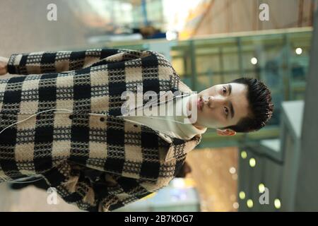 In this unlocated photo, Chinese singer Shan Yichun wore black hollow ...