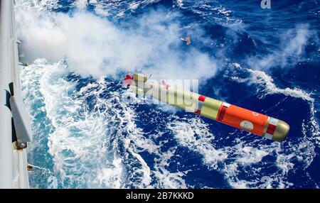 A Mark 46 torpedo is launched from the destroyer USS STUMP (DD-978 ...