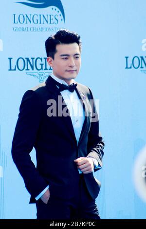 --FILE--Chinese actor Sun Yizhou, also known as Sean Sun, shows off ...
