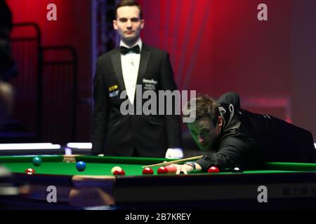 David Gilbert of England plays a shot to Mark Williams of Wales in ...