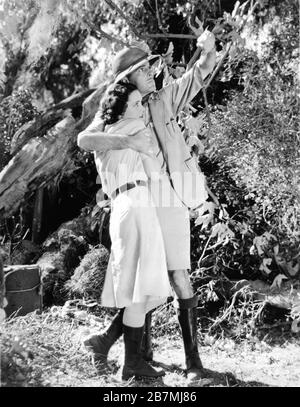 NEIL HAMILTON as Harry Holt and MAUREEN O'SULLIVAN as Jane Parker pose ...