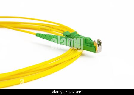 fiber optic single mode patch cord E2000 LSH connector isolated on ...