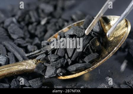 Closeup of a smoking styrax resin, in front of a dark background Stock ...