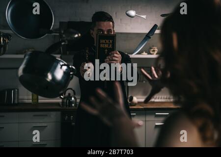 Exorcism of exorcist, levitation and woman possessed by the devil Stock ...