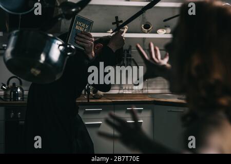 Exorcism of exorcist, levitation and woman possessed by the devil Stock ...