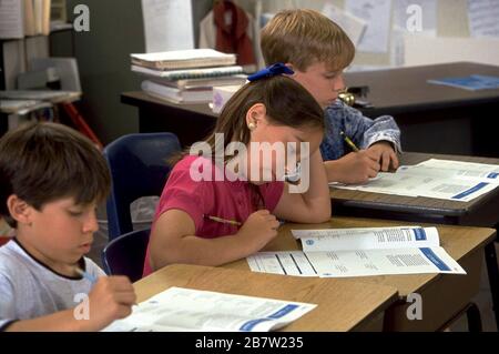 Austin, Texas USA: Fourth grade students using Apple computers and ...