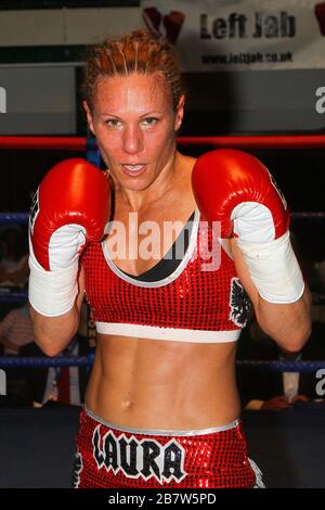 Laura Saperstein (red shorts) defeats Borislava Goranova in a Super ...