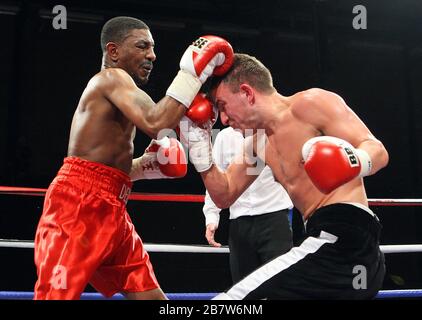 Lewis Pettitt (black shorts) defeats Delroy Spencer in a Featherweight ...
