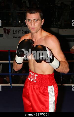 Eddie Corcoran (red shorts) defeats Sergejs Volodins in a Welterweight ...
