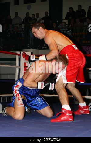 Eddie Corcoran (red shorts) defeats Sergejs Volodins in a Welterweight ...