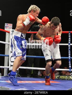 Ashley Sexton (blue shorts) defeats Darli Gonclaves Pires in a ...