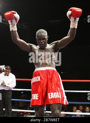 Eric Ochieng (red shorts) defeats Matt Scriven in a Light-Middleweight ...