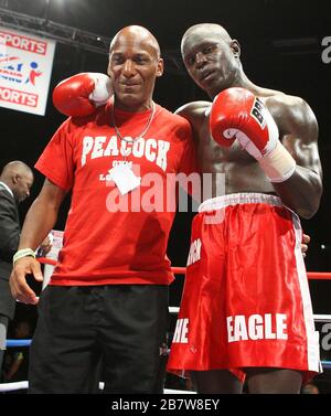 Eric Ochieng (red shorts) defeats Matt Scriven in a Light-Middleweight ...