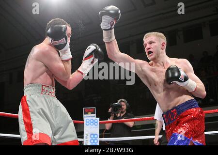 Ryan Taylor (red/blue shorts) defeats Graham Fearn in a Lightweight ...