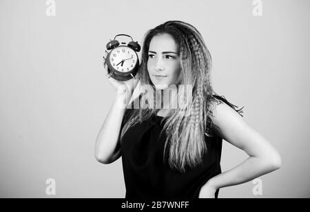 Pretty girl managing her time. Overwork or being late. Timing issues ...