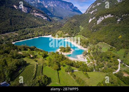 Lago di Tenno in autumn, small beautiful lake in Italian Alps. Trento ...