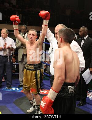 Jason Booth (Nottingham, gold shorts) defeats Rocky Dean (Thetford ...