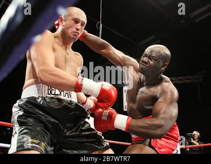 Larry Olubamiwo (red shorts) defeats Scott Belshaw in a Heavyweight ...