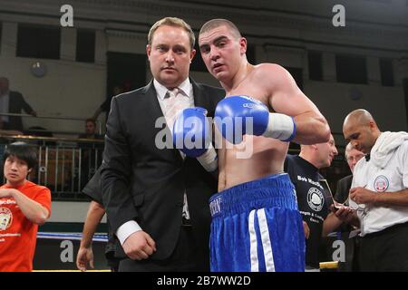 Johnny Garton (blue) shorts defeats Danny Dontchev in a Welterweight ...