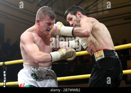 Gary Buckland (white/green shorts) defeats Stevie Bell (black shorts ...