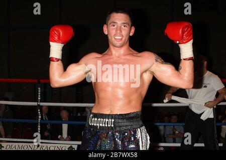 Tony Conquest (dark blue/silver shorts) defeats Prnce George Akrong in ...