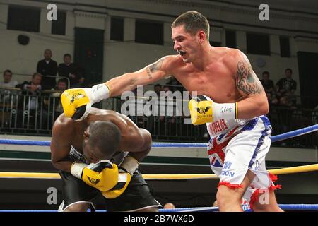 Tony Conquest (white shorts) defeats Toks Owoh in a Cruiserweight ...