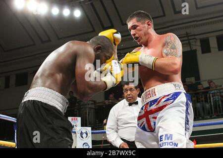 Tony Conquest (white shorts) defeats Bobby Scott in a Light-Heavyweight ...