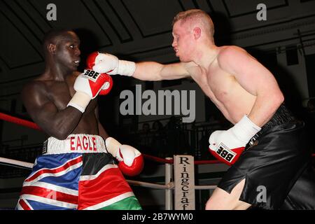 Luke Robinson (black shorts) defeats Erick Ochieng in a ...