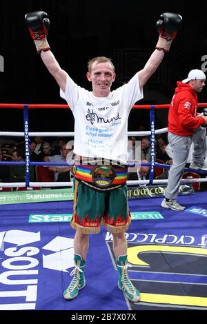 Jamie Arthur (green shorts) defeats Kris Hughes (black shorts) in a ...