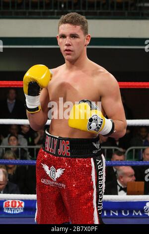 Billy Joe Saunders (red shorts) defeats Tommy Tolan in a Middleweight ...