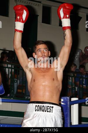 Tony Conquest (white shorts) defeats Bobby Scott in a Light-Heavyweight ...