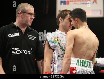 Ashley Sexton (silver shorts) defeats Usman Ahmed in a Flyweight boxing ...