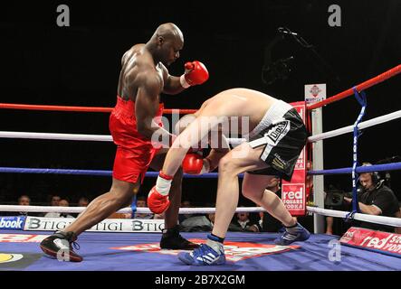 Larry Olubamiwo (red shorts) defeats Colin Kenna in a Heavyweight ...