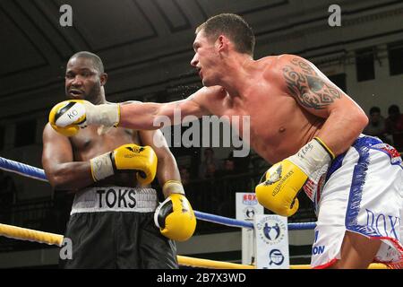 Tony Conquest (white shorts) defeats Toks Owoh in a Cruiserweight ...
