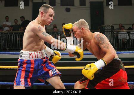 Matty Tew (red/blue shorts) defeats Robin Deakin in a Light ...