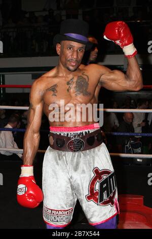 Darren Hamilton (silver/pink shorts) defeats Peter McDonagh in a ...